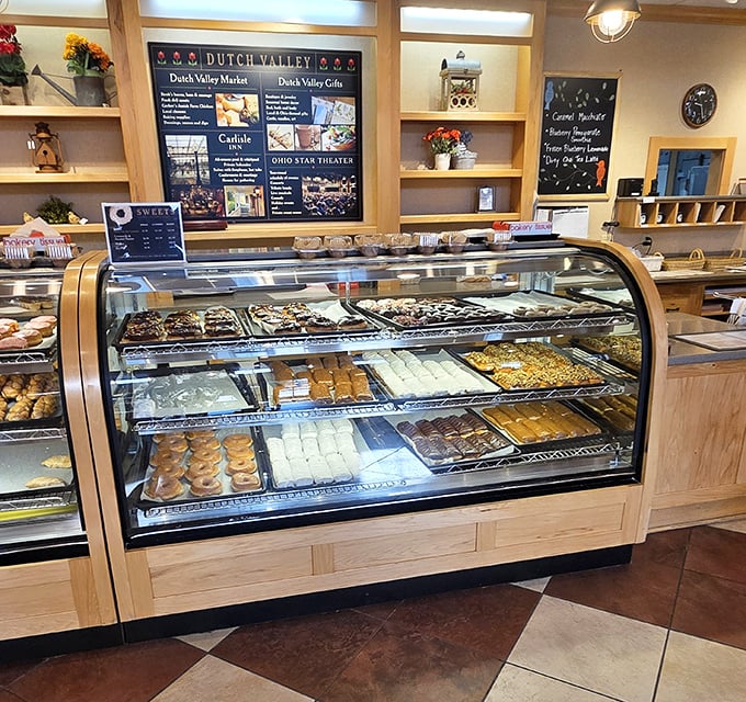 Behind this glass lies temptation in its purest form. Cookies, bars, and pastries arranged like treasures in a museum of deliciousness.