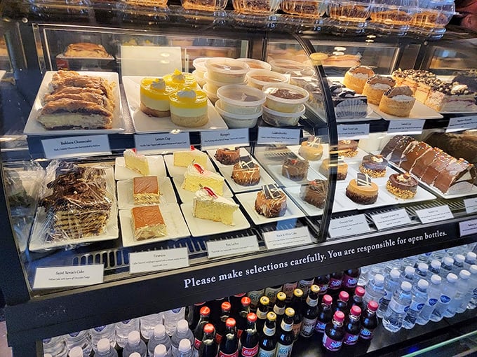 A display case of sweet temptations. Each dessert promises a different path to bliss—the only wrong choice is not choosing one.