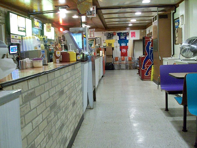 The concession stand corridor – a time tunnel of movie treats. This hallway has witnessed countless butter vs. no-butter debates.