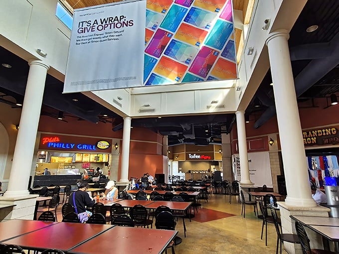 The food court oasis – where weary shoppers refuel on Philly cheesesteaks and caffeine before embarking on the second leg of their retail marathon.