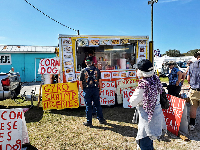 The universal language of street food speaks fluently here. Gyros, corn dogs, and cheese steaks—the holy trinity of flea market fuel.