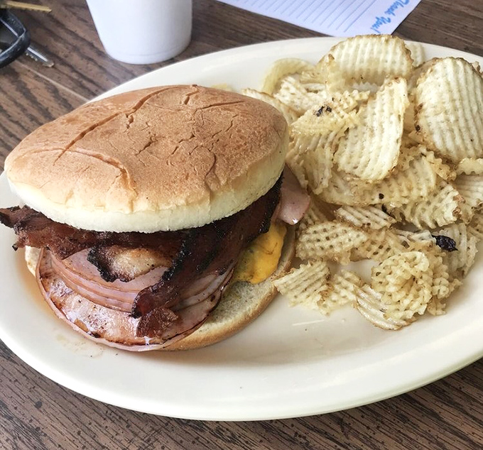 A sandwich that requires both hands and several napkins—the universal sign of something worth every messy bite.