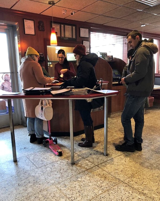 The host station – first point of contact in the diner experience, where the wait for a table becomes part of the anticipation.