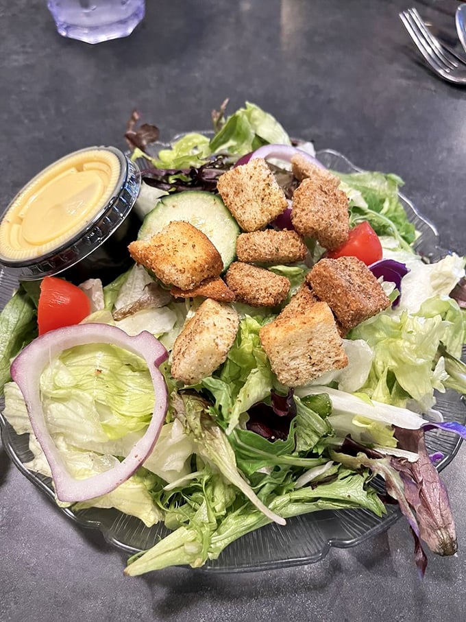 A garden salad that actually looks garden-fresh—those house-made croutons aren't just bread cubes, they're crunchy little flavor bombs.