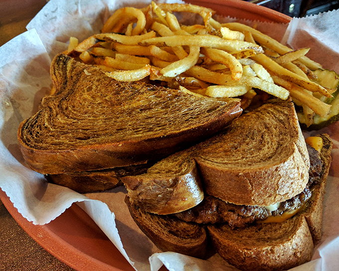 A proper diner melt on hearty bread with perfectly golden fries—the kind of lunch that fuels both body and soul.