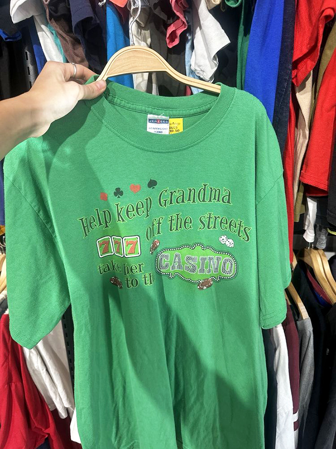 "Help keep Grandma off the streets"—this vintage tee delivers the kind of conversation starter that makes thrift shopping a cultural expedition.