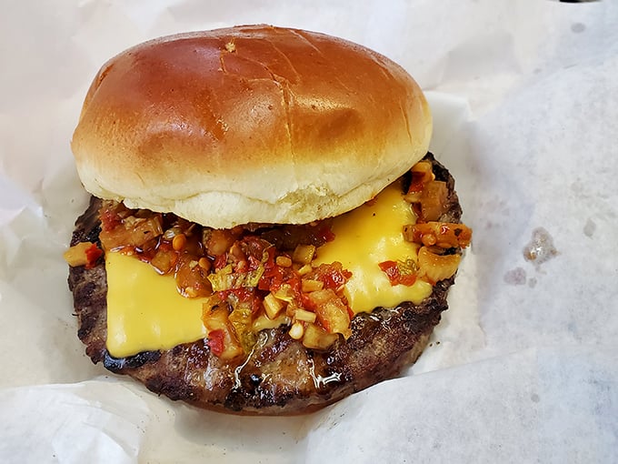The cheeseburger gets the giardiniera treatment, proving that Chicago's favorite condiment plays well with others. That cheese melt is pure food photography gold.