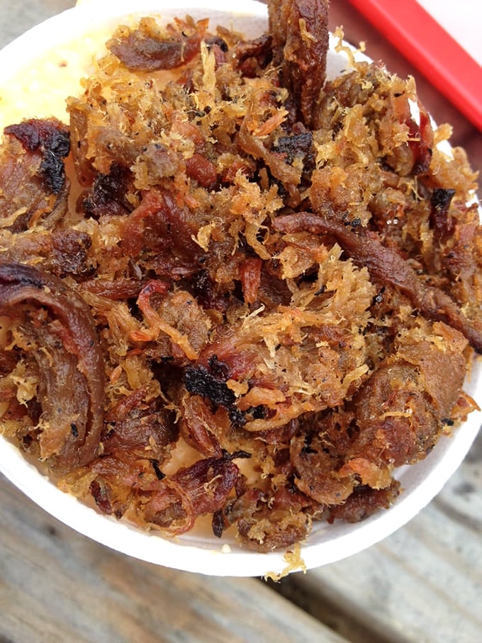 A mountain of perfectly pulled pork with that ideal mix of bark and tender meat—this is what barbecue dreams are made of.