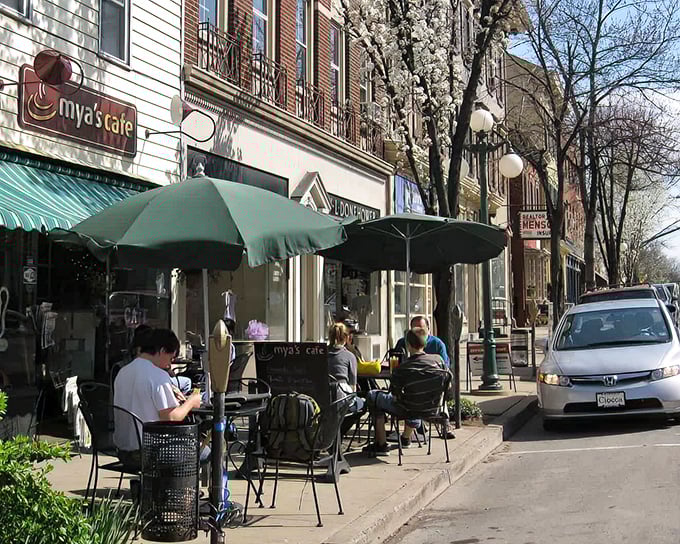 Mya's Café offers sidewalk dining where conversations happen face-to-face instead of through screens and emojis.