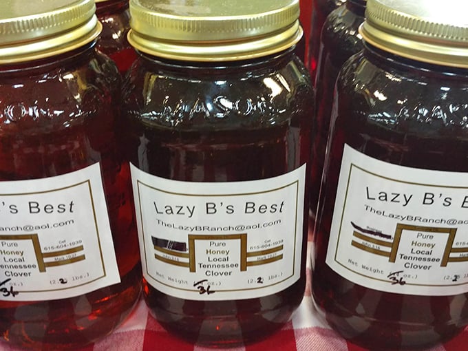 "Lazy B's Best" honey jars capture Tennessee sunshine in amber form – liquid gold that makes grocery store honey taste like sad, sticky disappointment.