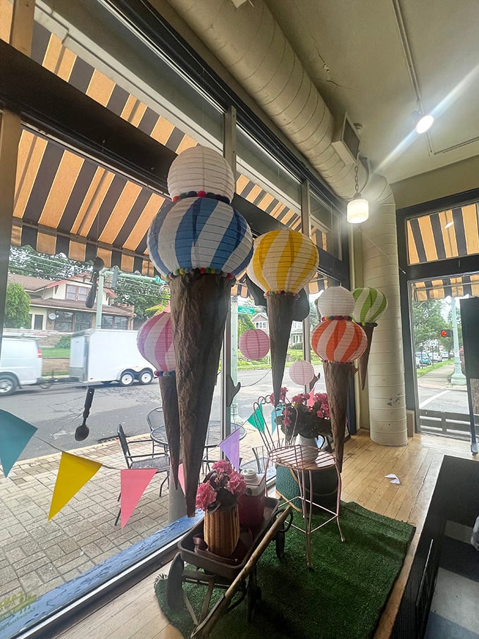 Paper lantern ice cream cones hanging in the window—a whimsical reminder that you've entered a place where fun is always on the menu.