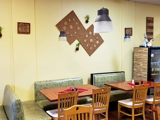Warm yellow walls and thoughtful decor create an atmosphere that says, "You're not just a customer—you're our dinner guest."