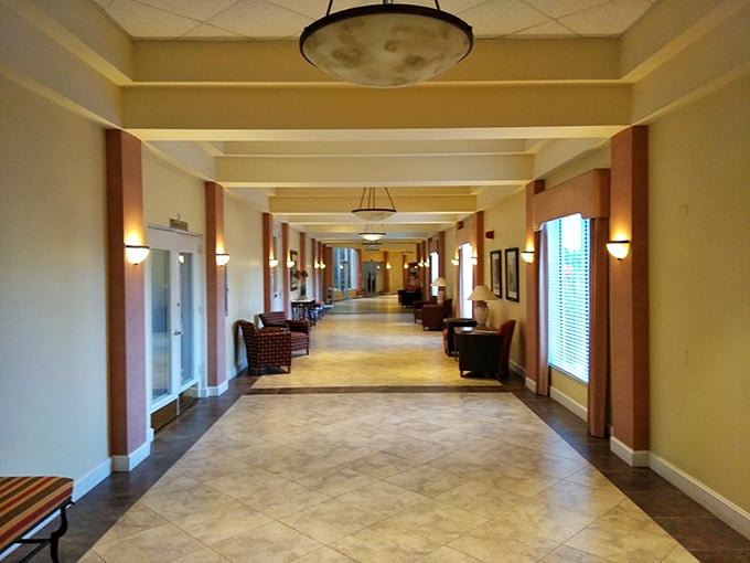Elegant hallways connect activity spaces – wide enough for golf cart gossip sessions and impromptu neighbor reunions.