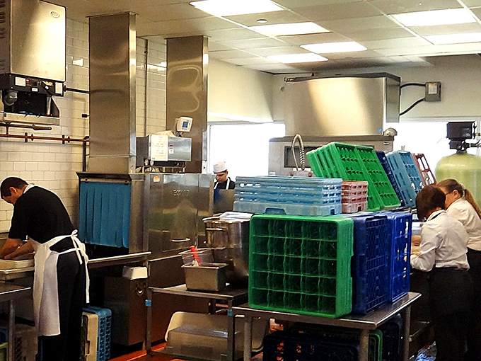 Behind the scenes, the kitchen hums with purpose. This is where the magic happens—where recipes passed down through generations come to life.