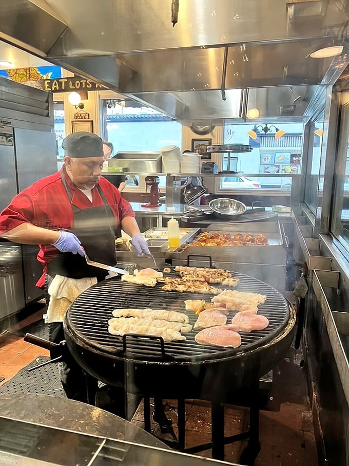 The circular grill – seafood's answer to King Arthur's round table, where every fillet is treated with equal respect and fire.