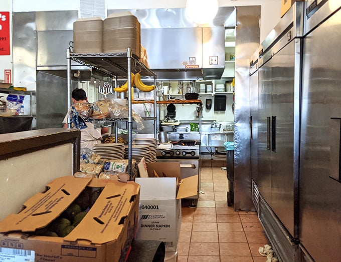 Behind every great breakfast is a kitchen that looks like this—organized chaos where magic happens between stainless steel and sizzling grills.