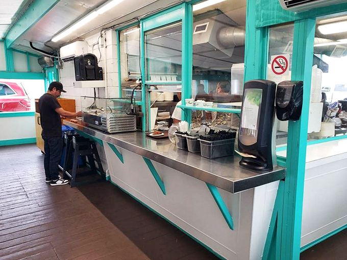 The ordering counter—that magical threshold between hunger and happiness. Choose wisely, though you really can't go wrong.