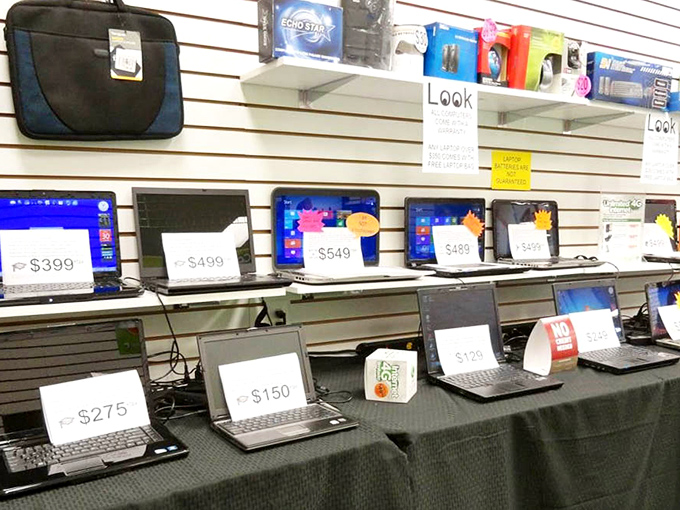 Laptop row presents a timeline of technological evolution – each machine with its own history, waiting for a second chapter.