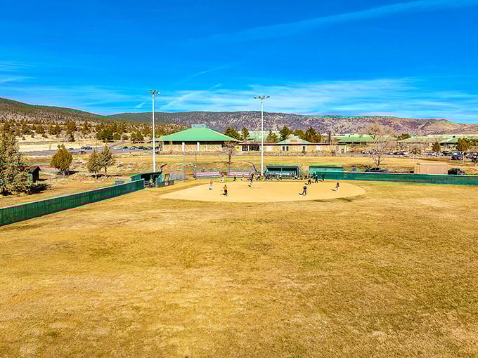 Susanville's baseball diamond sits like an emerald against the high desert backdrop, where America's pastime unfolds beneath impossibly blue skies.