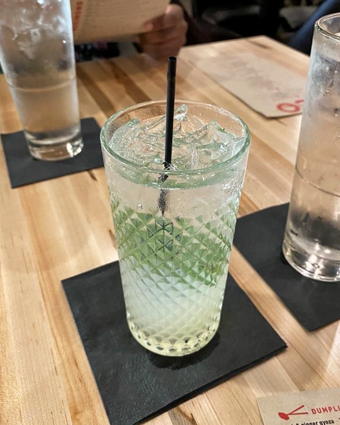 This isn't just a refreshing beverage—it's summer in a textured glass, with ice that tinkles like wind chimes on a perfect porch evening.