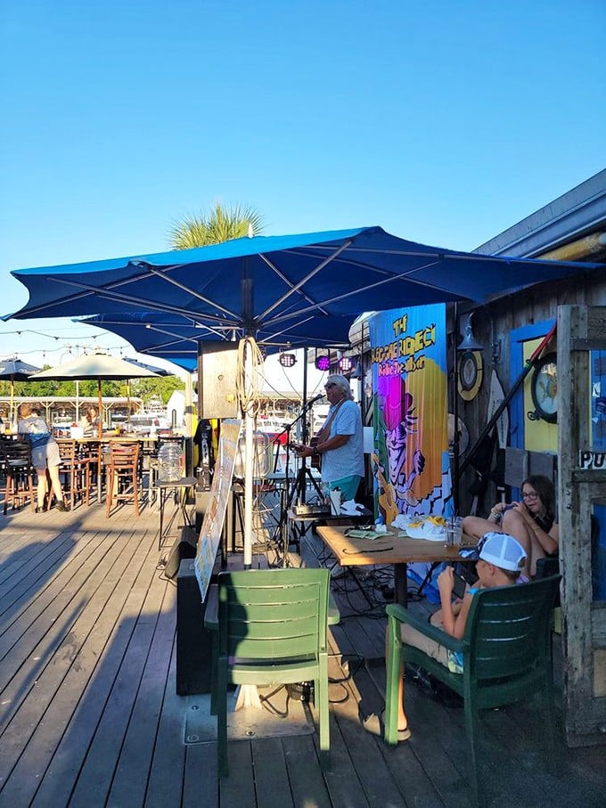 Live music on the deck—because fresh seafood tastes even better with a soundtrack of laid-back tunes and gentle water lapping nearby.