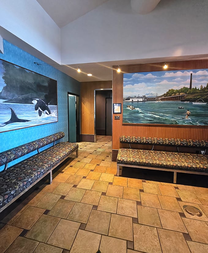 The waiting area features murals that tell Puget Sound stories. Even the benches seem to say, "Sit here, the seafood feast is worth it."