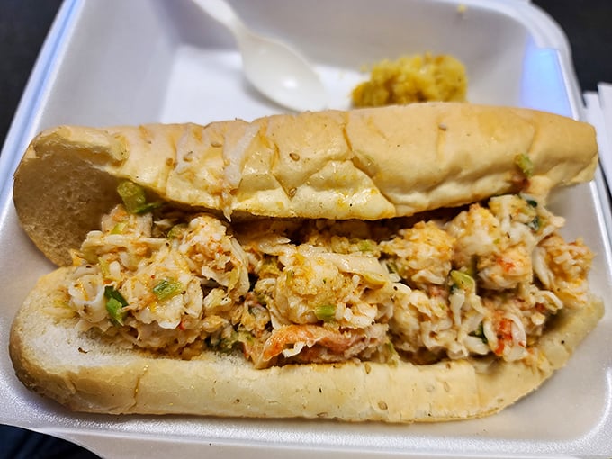 A sandwich bursting with what appears to be creamy, seasoned meat—proof that Saddleback's talents extend beyond traditional barbecue offerings.