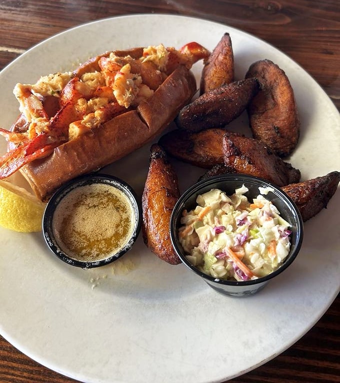 The lobster roll that launched a thousand road trips. Sweet meat nestled in buttery bread with plantains standing in for ordinary fries. 