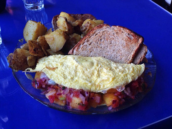 This isn't just an omelet—it's a colorful fiesta wrapped in eggs, where each bite delivers a confetti of flavors and textures.