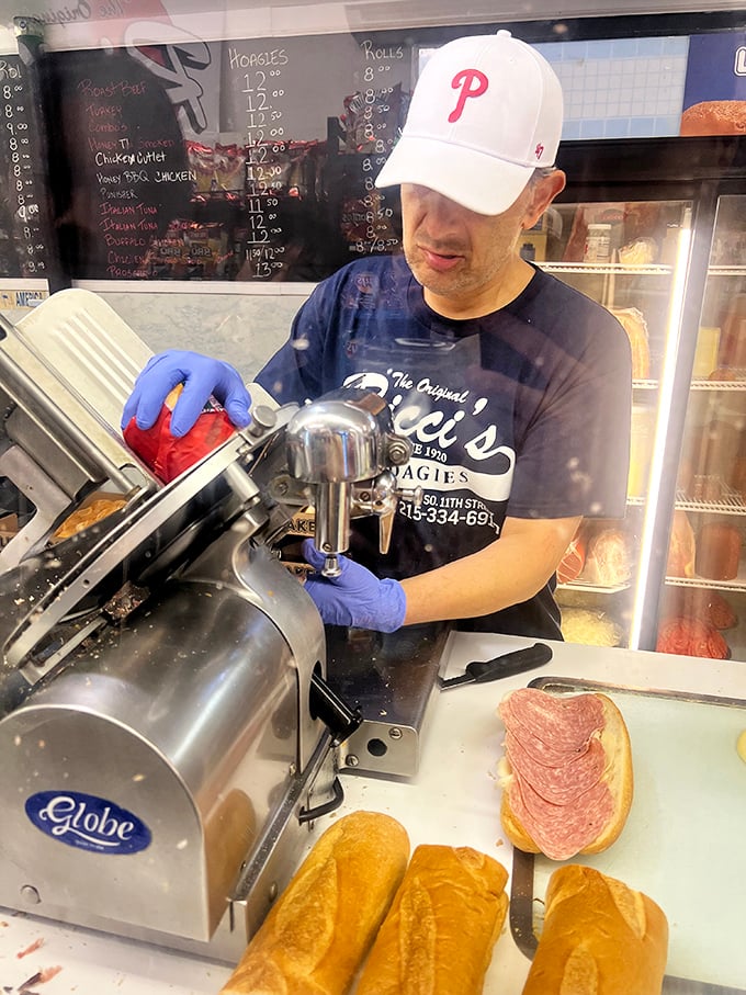 The meat slicer—workhorse of any great sandwich shop—transforms whole cuts into the paper-thin slices that define a proper hoagie.