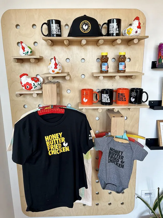 When you love the chicken so much you want to wear the t-shirt—merchandise that lets you take the experience home.