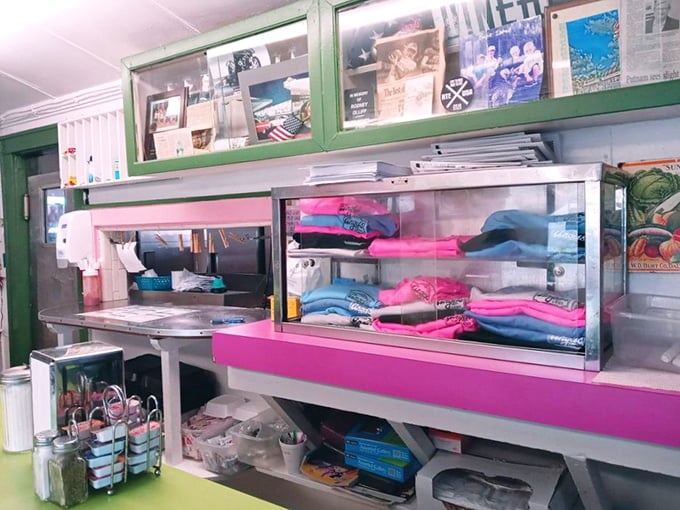 The merchandise display reminds you that some souvenirs feed more than just memories—they support local institutions that deserve to thrive.