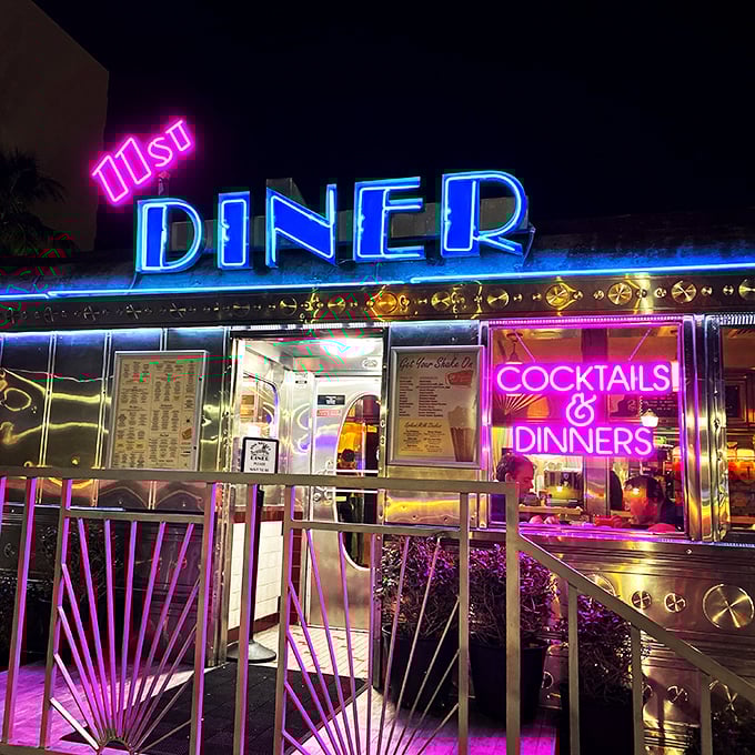 When the sun sets, the neon rises. The diner's electric glow transforms from daytime nostalgia to nighttime South Beach cool.