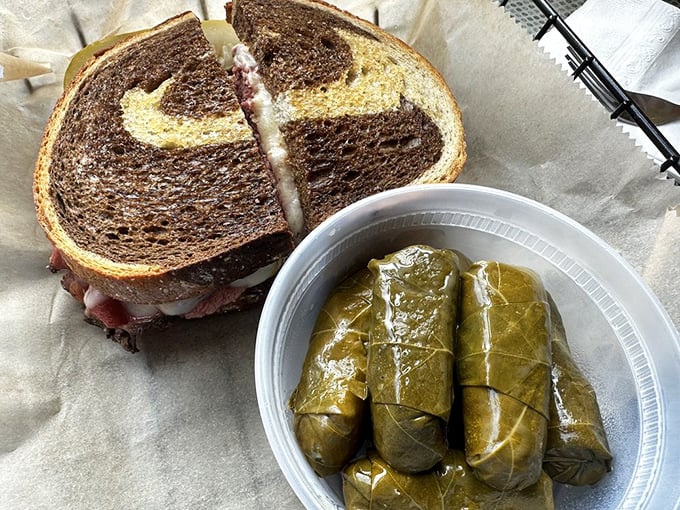 The marbled rye sandwich with its pickle sidekicks – a classic New York deli experience that somehow tastes even better in Pittsburgh.