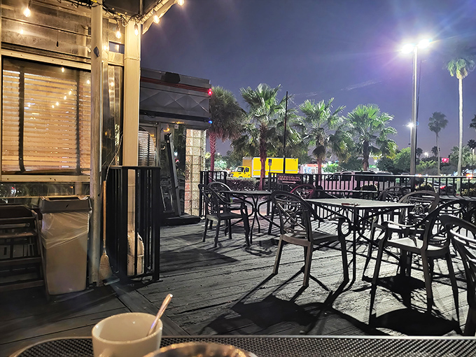 Nighttime transforms the patio into a twinkling oasis—proof that pancakes taste even better under the glow of Florida stars.