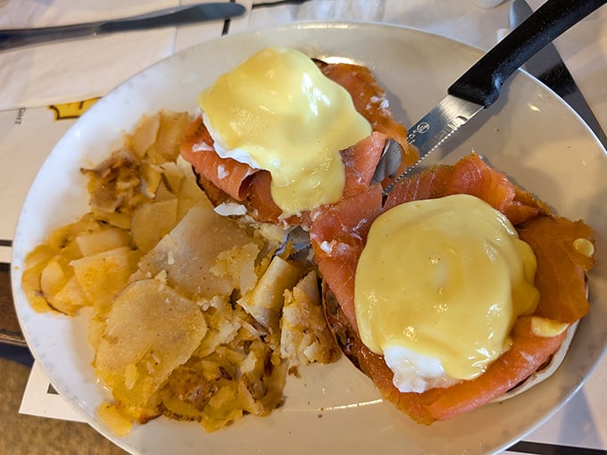 The Nova Scotia Benedict—where salmon and hollandaise engage in a dance so beautiful it makes breakfast feel like the fanciest meal of the day.