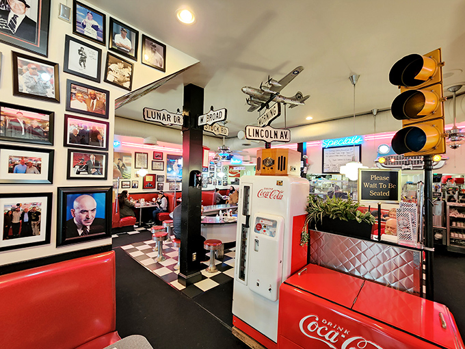 Every inch tells a story—street signs, vintage appliances, and photographs creating a museum where the exhibits come with side orders of hash browns.