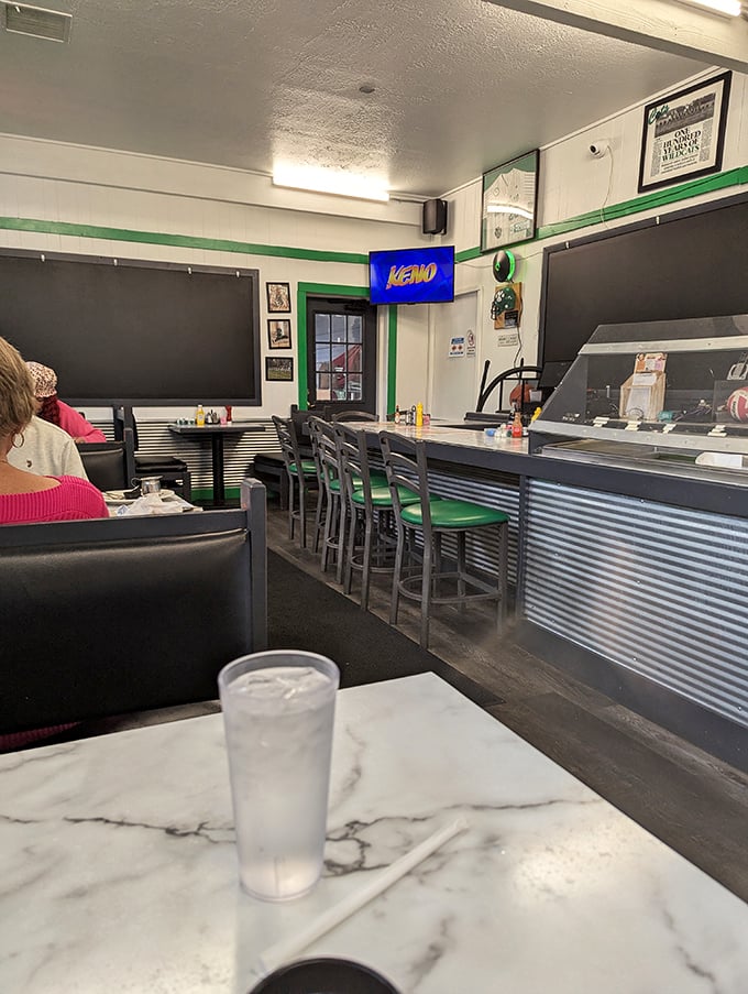 Every small town cafe needs a good counter with green stools where regulars can perch and solve the world's problems over coffee.