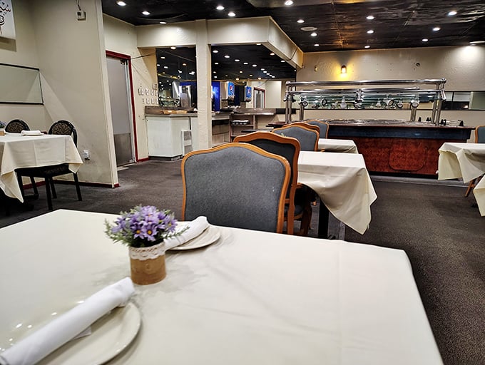 Elegant simplicity defines the dining room, where every table feels like the best seat in the house and conversations flow as smoothly as the mint tea.