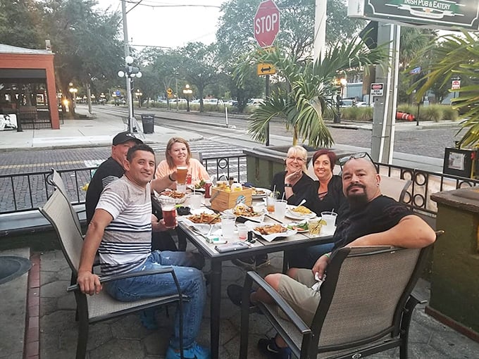 Outdoor dining with a view of Tampa street life—where Irish hospitality meets Florida's perfect weather for an unbeatable combination.