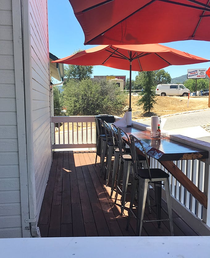 The outdoor patio offers mountain views with your meat sweats—California BBQ dining at its most scenic.