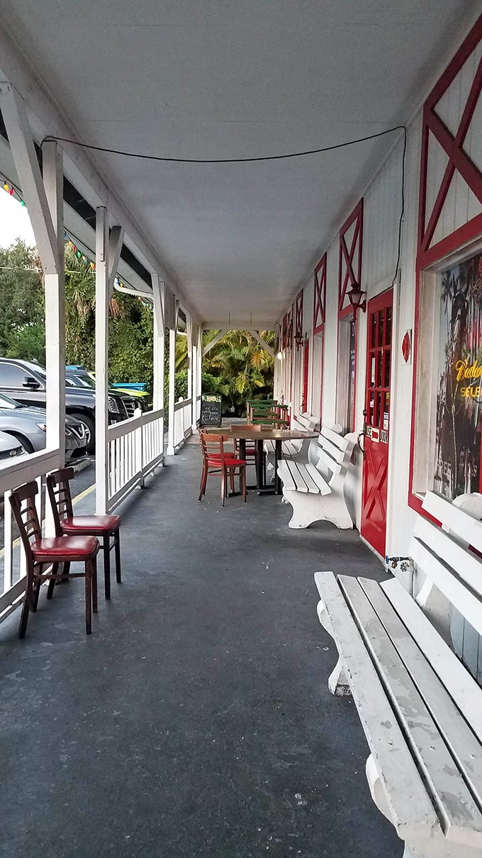 The front porch seating area – where "al fresco dining" meets "good old-fashioned porch sitting" for the perfect Florida meal experience.