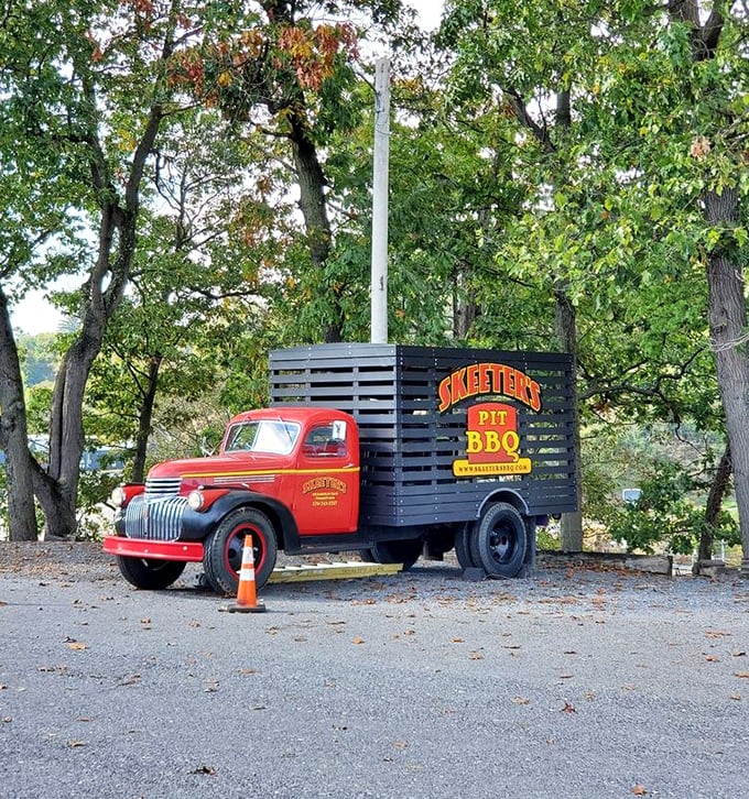 That vintage delivery truck isn't just decoration—it's a time machine to when BBQ first conquered America's heart, one smoky bite at a time.