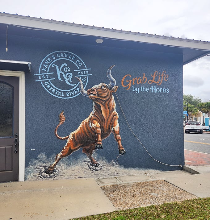 The exterior mural boldly proclaims "Grab Life by the Horns" – solid advice whether you're ordering steak or making life decisions.
