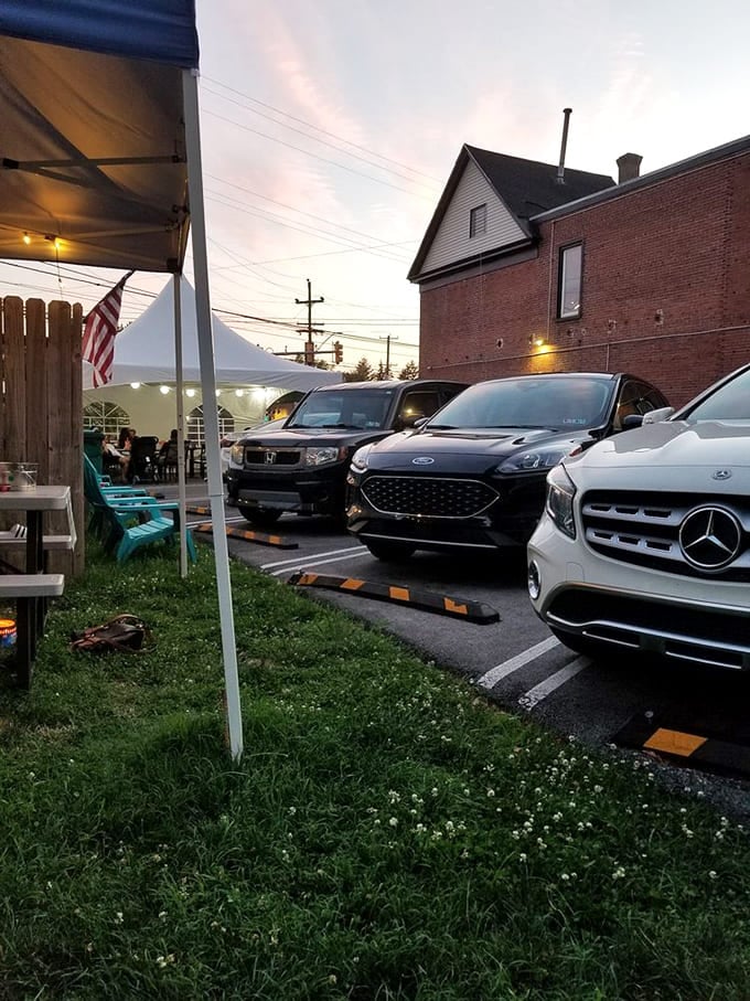Outdoor seating where summer evenings transform ordinary meals into special occasions. Even luxury cars line up—good taste knows no boundaries.