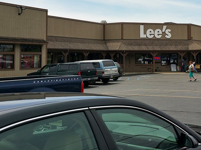 The parking lot tells its own story—pickup trucks and sedans gathered like faithful pilgrims at a temple of comfort food.
