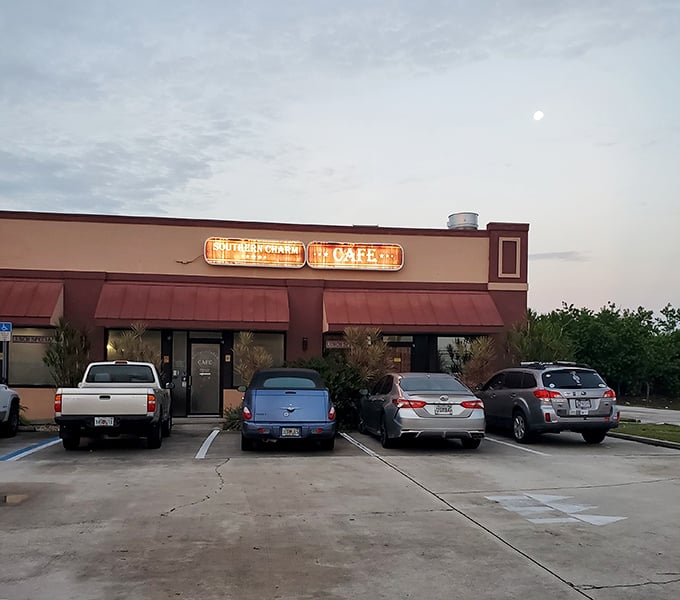 Even at dusk, the illuminated sign serves as a beacon for hungry travelers – the parking lot never stays empty for long.
