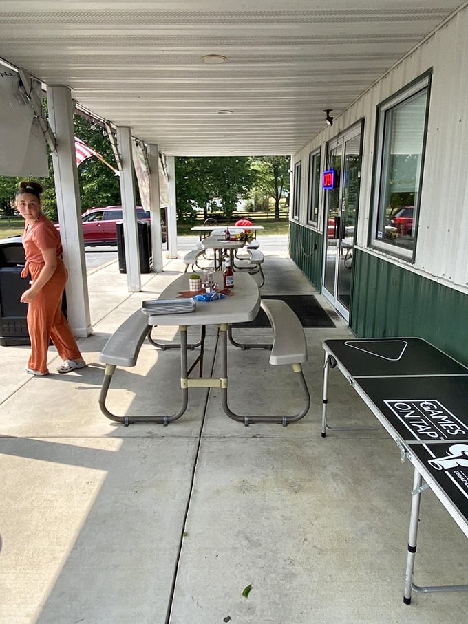 The covered patio offers a front-row seat to the smoker's aromatic performance—nature's dinner theater with the best possible soundtrack.