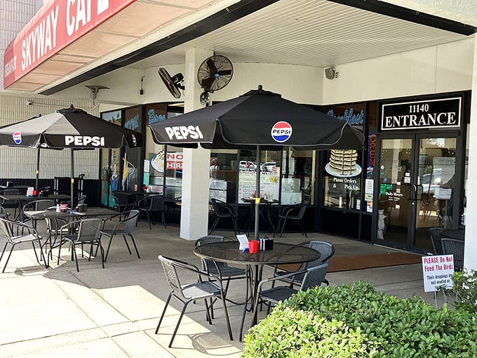 The outdoor patio offers al fresco dining under Pepsi umbrellas – Florida's version of the Parisian sidewalk café, with more sunscreen required.