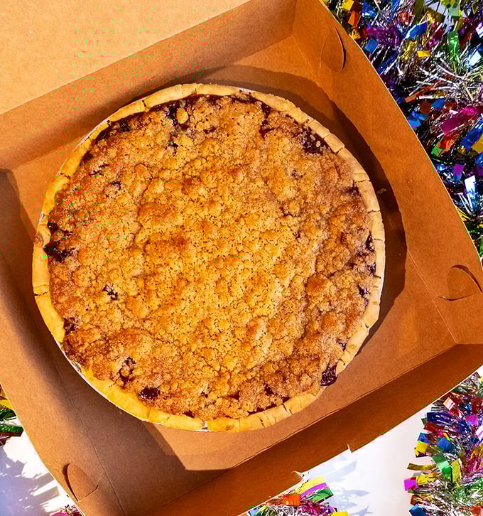 This crumb-topped pie is what happens when fruit and butter have a beautiful relationship. The golden crust practically glows with delicious promise.